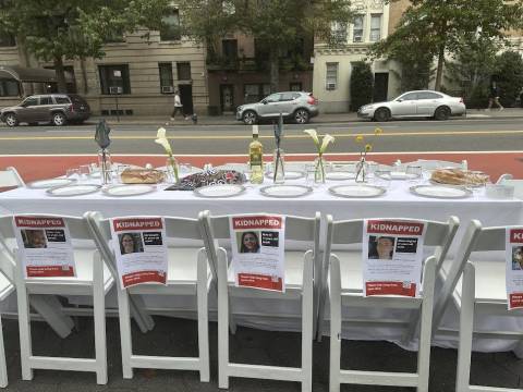 Empty Shabbat Table Installation Commemorates Hostages taken by Hamas